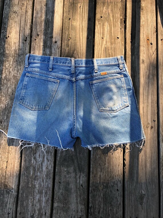 Vintage Rustler faded cutoffs with stenciled dream ca… - Gem