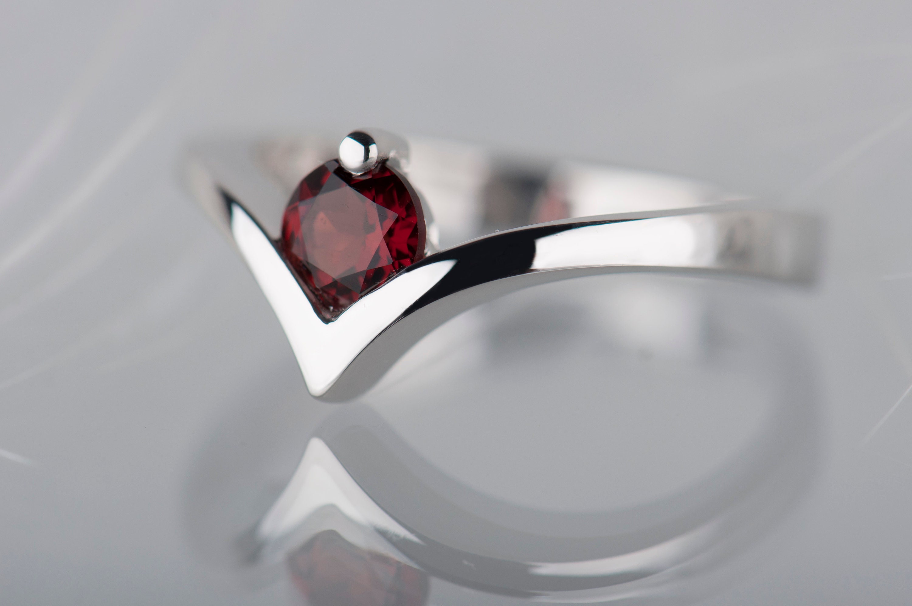 Sterling silver red garnet chevron ring