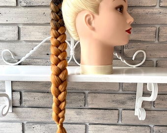 Two Black Braids on Metal Rings. Kanekalon, False Braids, Braid on an ...