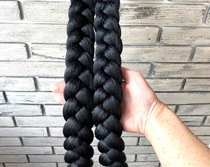 Two Black Braids on Metal Rings. Kanekalon, False Braids, Braid on an ...