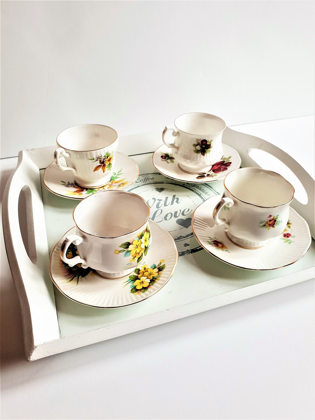 An Elegant Lot of FIVE Bone China Tea Set, Teacup and Saucer, High ...