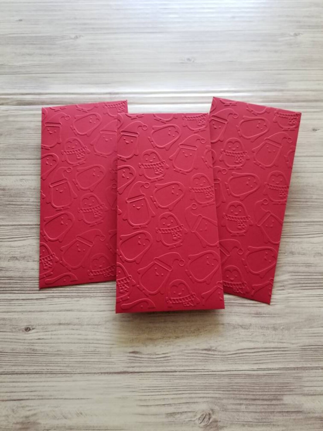 Large Christmas Red Envelope With Embossed Penguins. Christmas Red ...