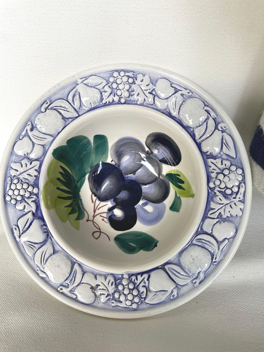Hand Painted Italian Bowl With Grape Motif Center Blue Embossed Rim ...