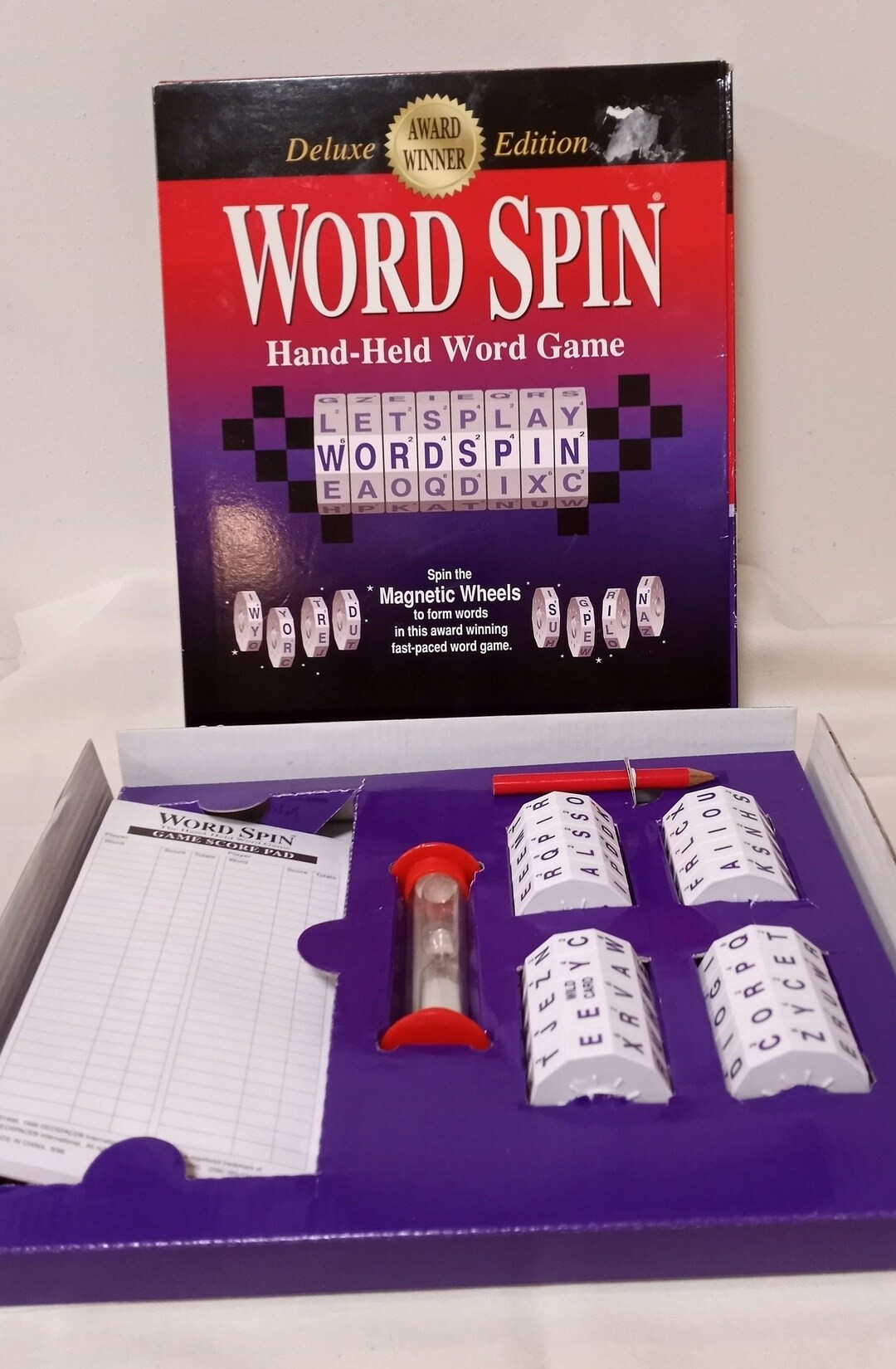Magnetic Word Spin Game. Word Spin is a Hand-held Word Game, Great for ...