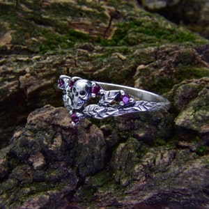 Minimalist Witch Wedding Ring With Carved Ruby Skull on Forest Leafy ...