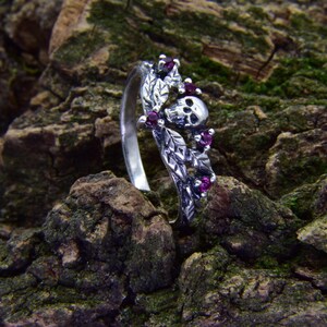 Minimalist Witch Wedding Ring With Carved Ruby Skull on Forest Leafy ...