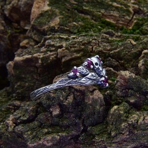Minimalist Witch Wedding Ring With Carved Ruby Skull on Forest Leafy ...