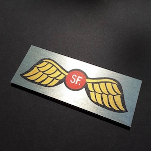 Small Jedburgh Wings on Brushed Aluminium - Etsy