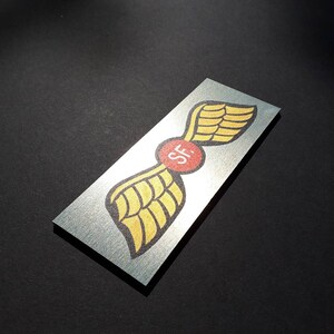 Small Jedburgh Wings on Brushed Aluminium - Etsy