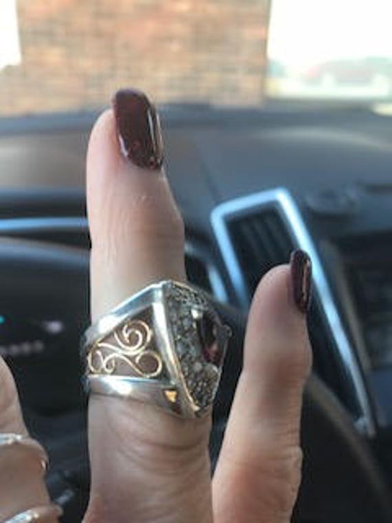 This is a gorgeous custom made ring that is made of s… - Gem