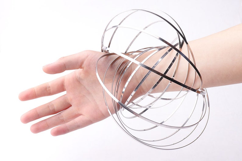 Flow Rings Rainbow/silver Kinetic Ring Spring Arm Slinky Flow - Etsy