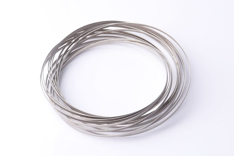 Flow Rings Rainbow/silver Kinetic Ring Spring Arm Slinky Flow - Etsy