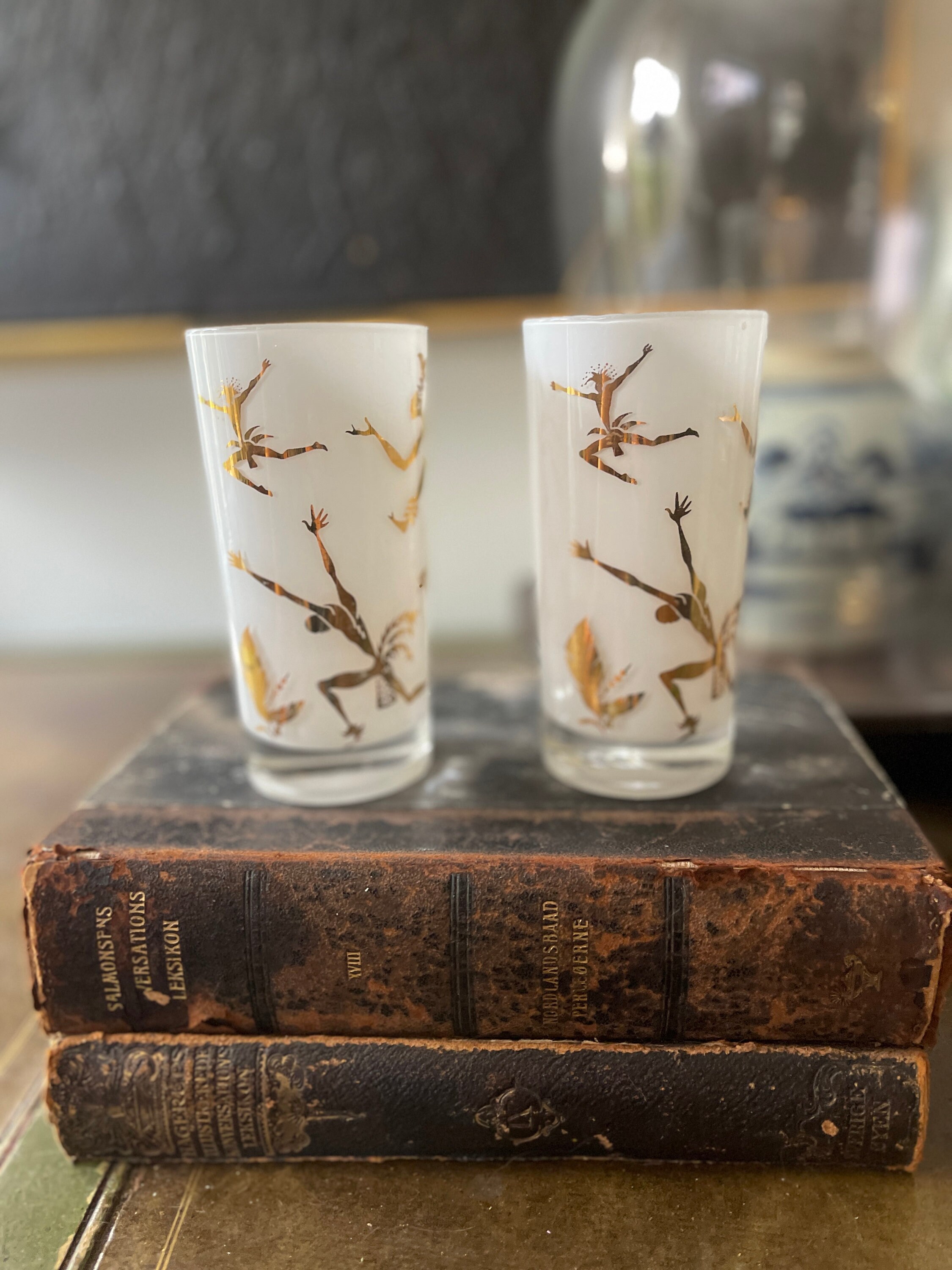 Pair of White and Gold MCM African Dancer Glassware