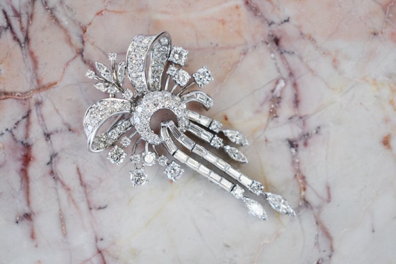 Platinum brooch store