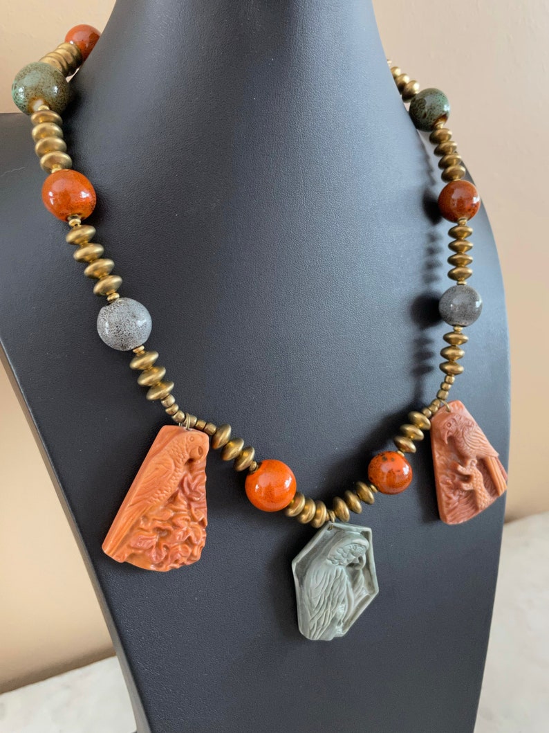 Birds of a Feather. Tryptic of Parrots Carved in Natural Red Malachite ...