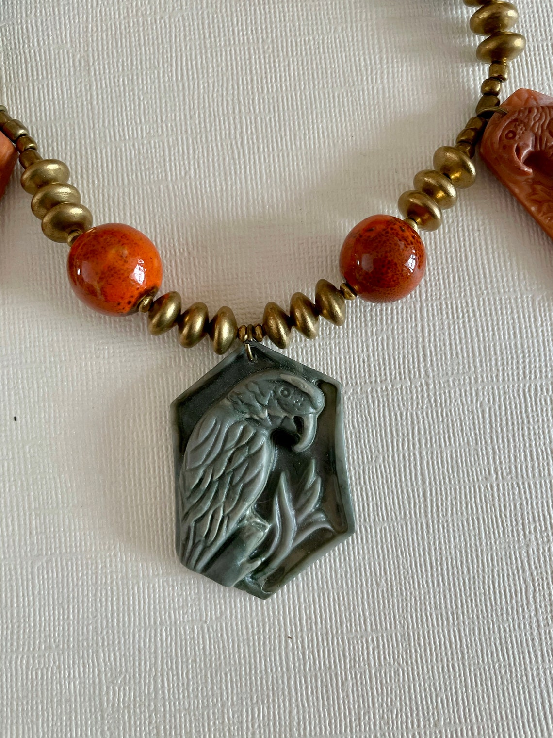 Birds of a Feather. Tryptic of Parrots Carved in Natural Red Malachite ...