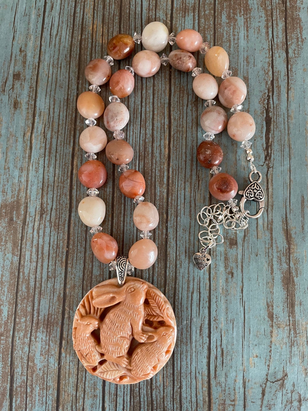Carved Rabbits in Red Malachite, Tumbled Chalcedony Beads Interspersed ...