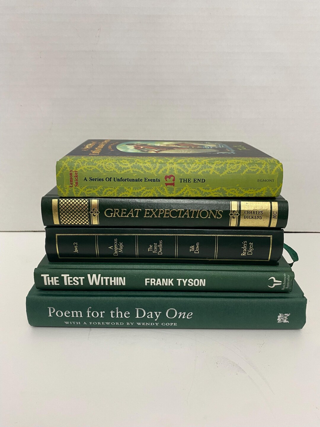 Green Stacked Books Decor Decorative Coffee Table Styling on Trend Home ...