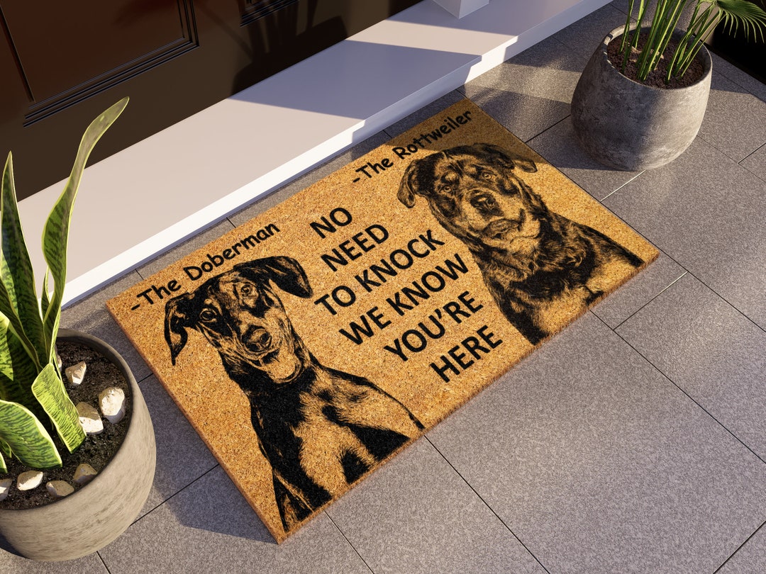 The Rottweiler Door Mat and the Cute Doberman, We Know You ARE Here ...