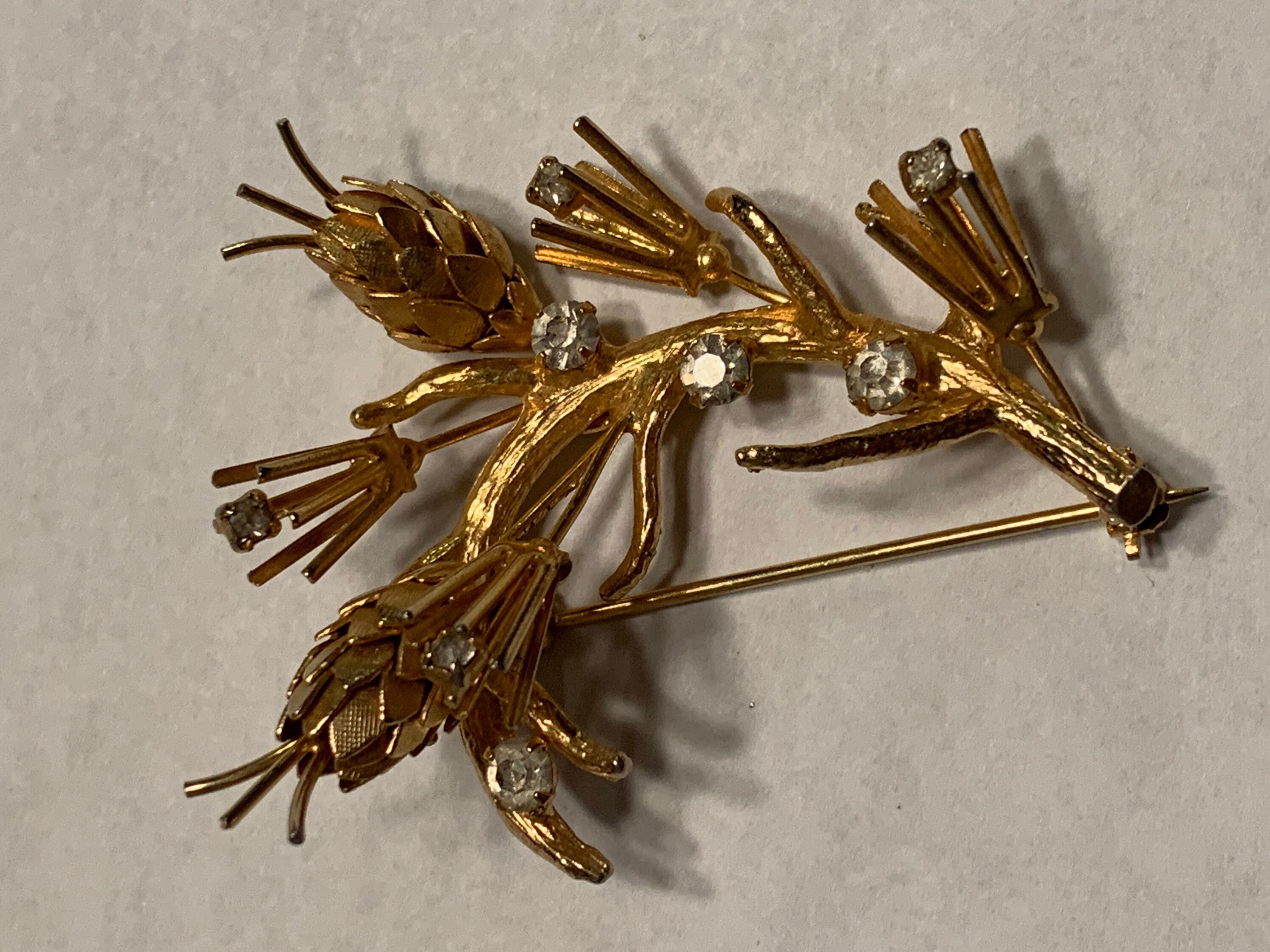 Vendome 1950s gold and crystal brooch | Etsy