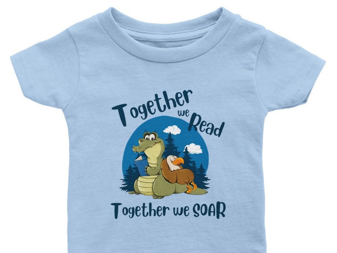Together We Read, Together We Soar: Cute Baby T-shirt Featuring a Hand ...
