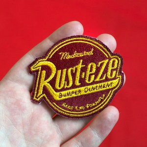 Rust-eze Logo From Disney & Pixar Cars Movie Fully Embroidered Sew-on ...
