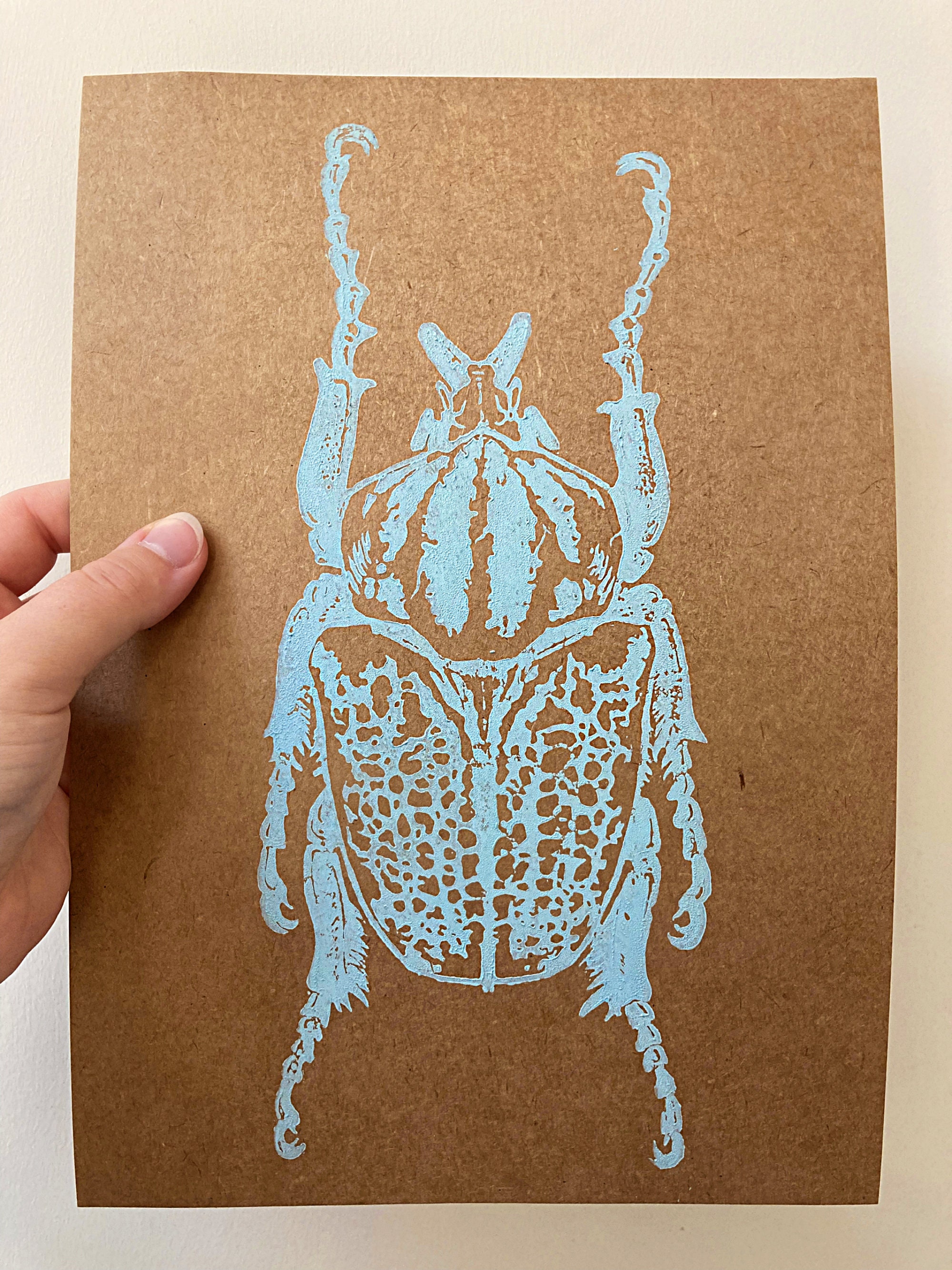 Baby blue 'Goliath Beetle' Linocut print on recycled brown card (A4 ...