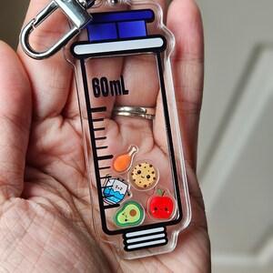 Tubie Feeding Shaker Keychain (with 5 Cute & Happy Food Charms, Double ...