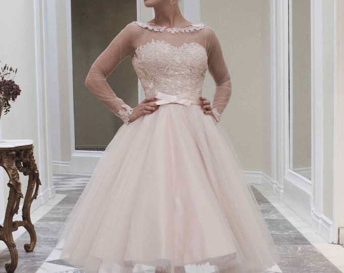 Lily is a Cute Short Blush Tea Length Wedding Dress With Daring Low ...