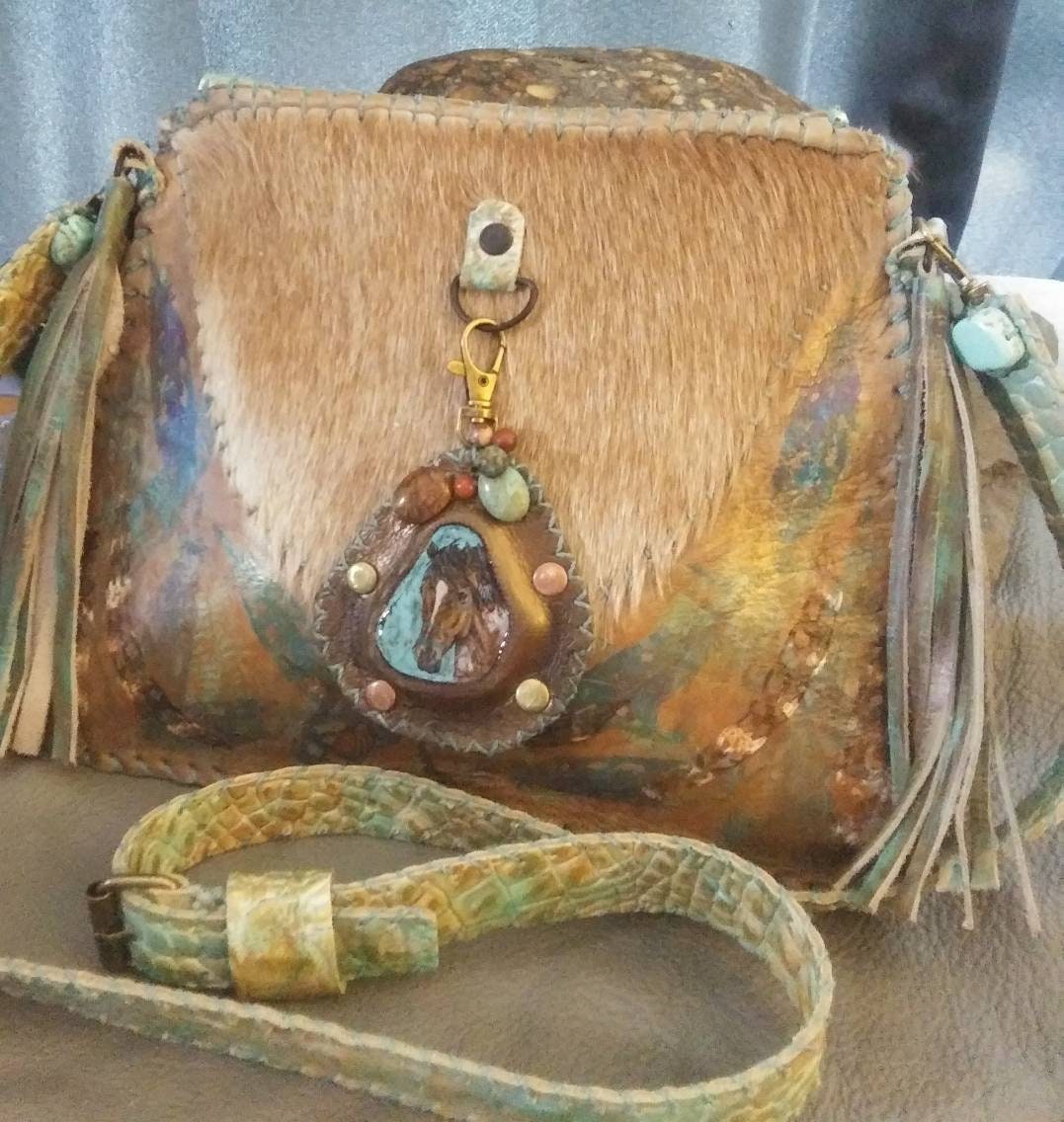 Western tooled leather purse | Native American art | painted feathers ...