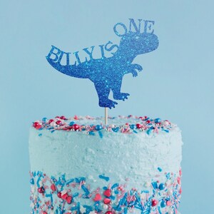 Personalised First Birthday Cake Topper. Dinosaur Theme. Name and Age ...