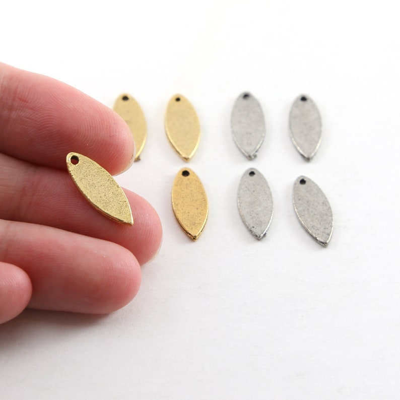 4 Pieces Pewter Metal Pointed Tag Stamping Oval Tag Charm 16mm X 6mm in ...