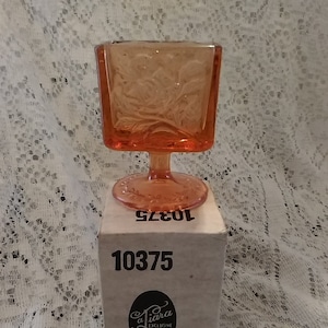 A Pink Tiara Exclusive Pedestal Glass Dish 10375, That Has an Embossed ...