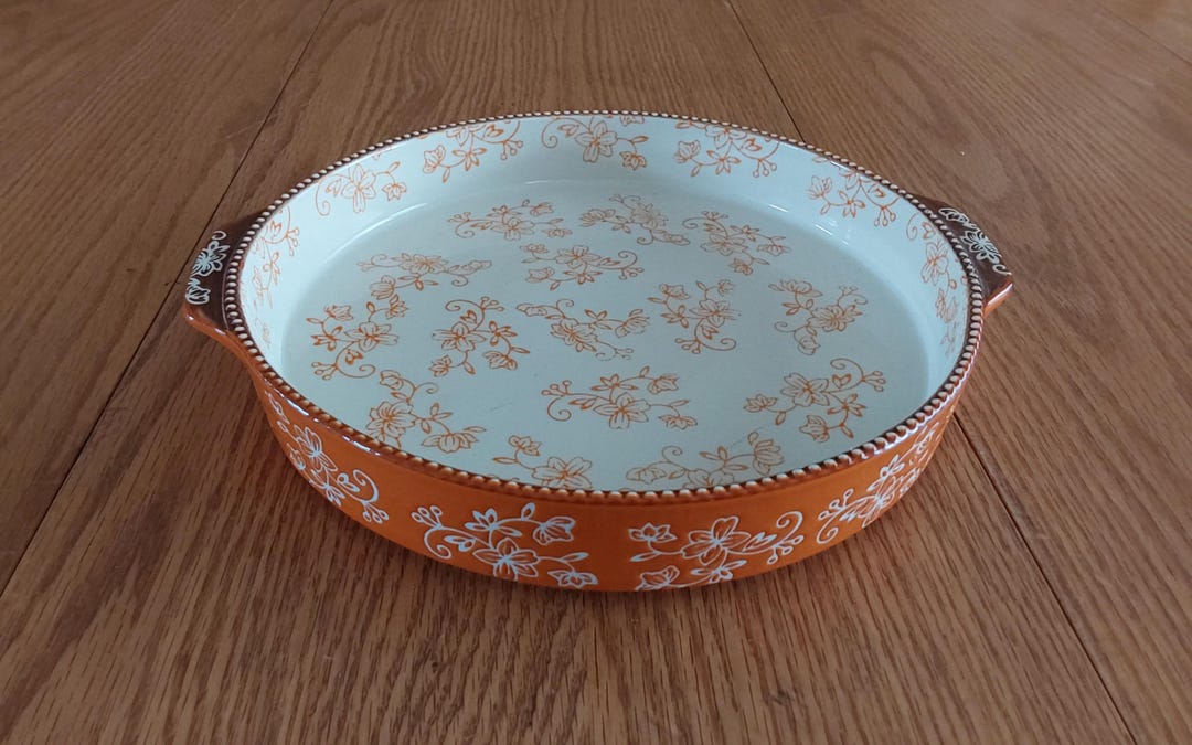 Temptations by Tara in the Orange Floral Lace Pattern is a 9.5" Round 1 ...