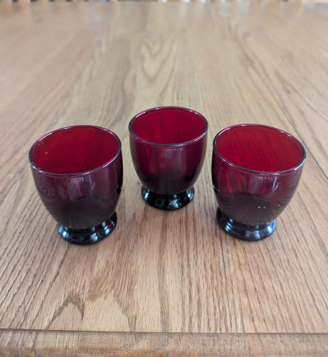 A Trio of Anchor Hocking Royal Ruby Baltic Pattern Juice Glasses. Glass ...