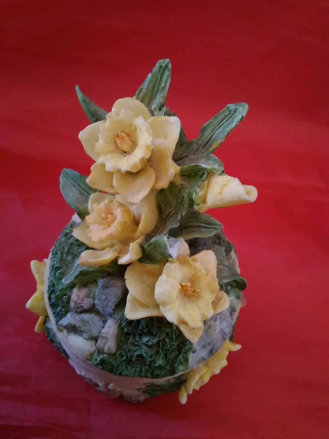 A Capodimonte Trinket Dish With Porcelain Daffodils Surrounding the ...