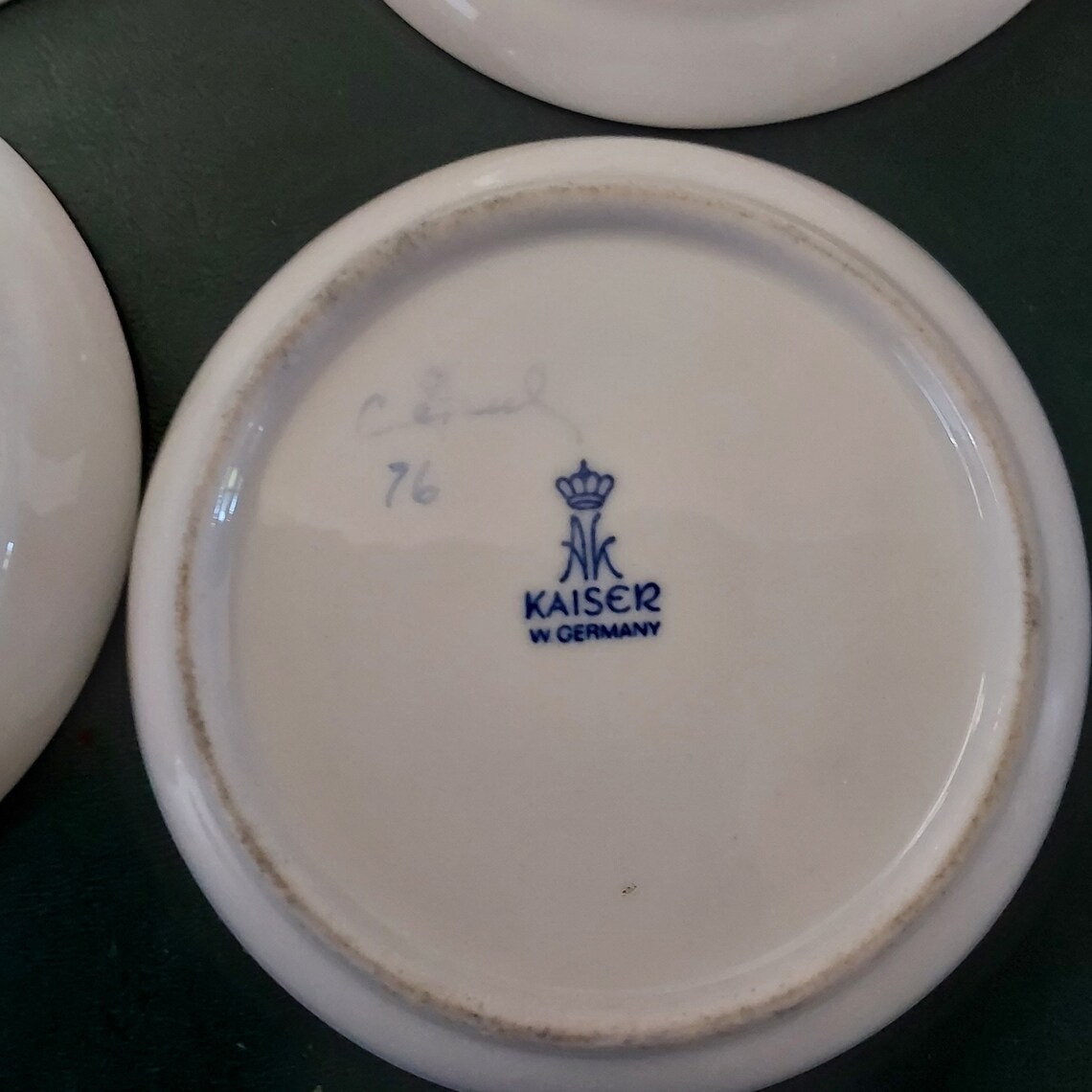 By AK Kaiser, is a Set of 4" White Porcelain Plates of the 4 Season ...