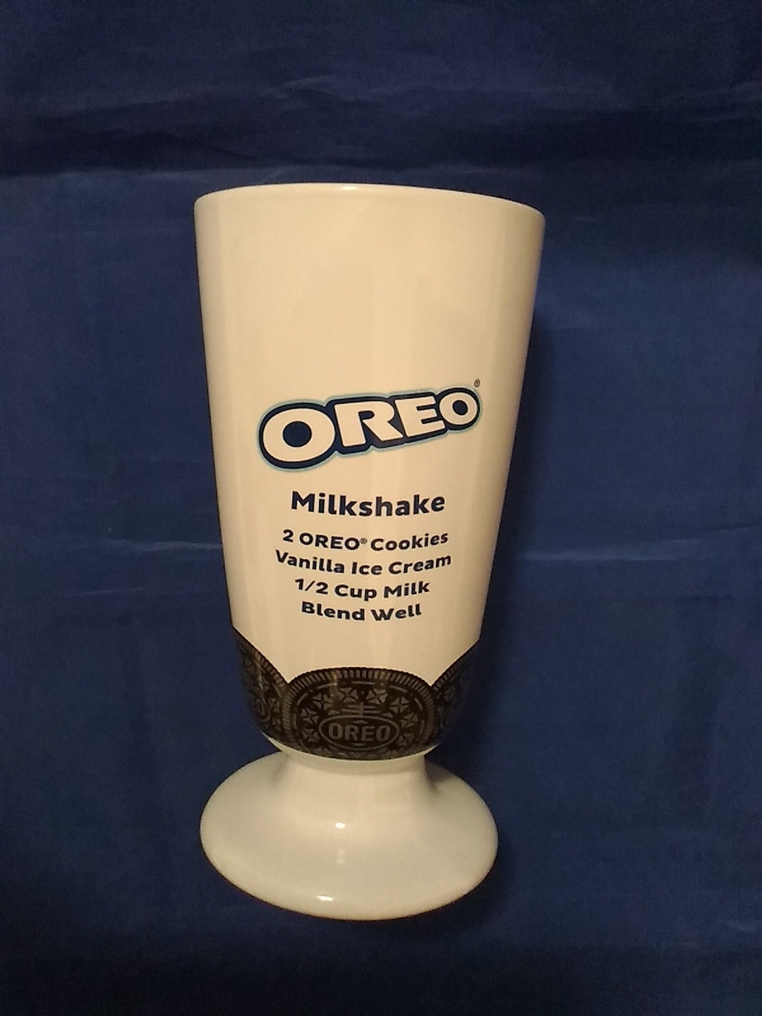 A White Ceramic Oreo Milkshake Tumbler With the Recipe of the Face ...