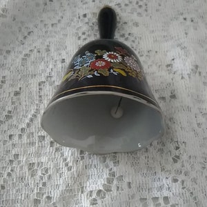 A Unusual Black Asian Inspired Porcelain Bell With a Large Floral ...