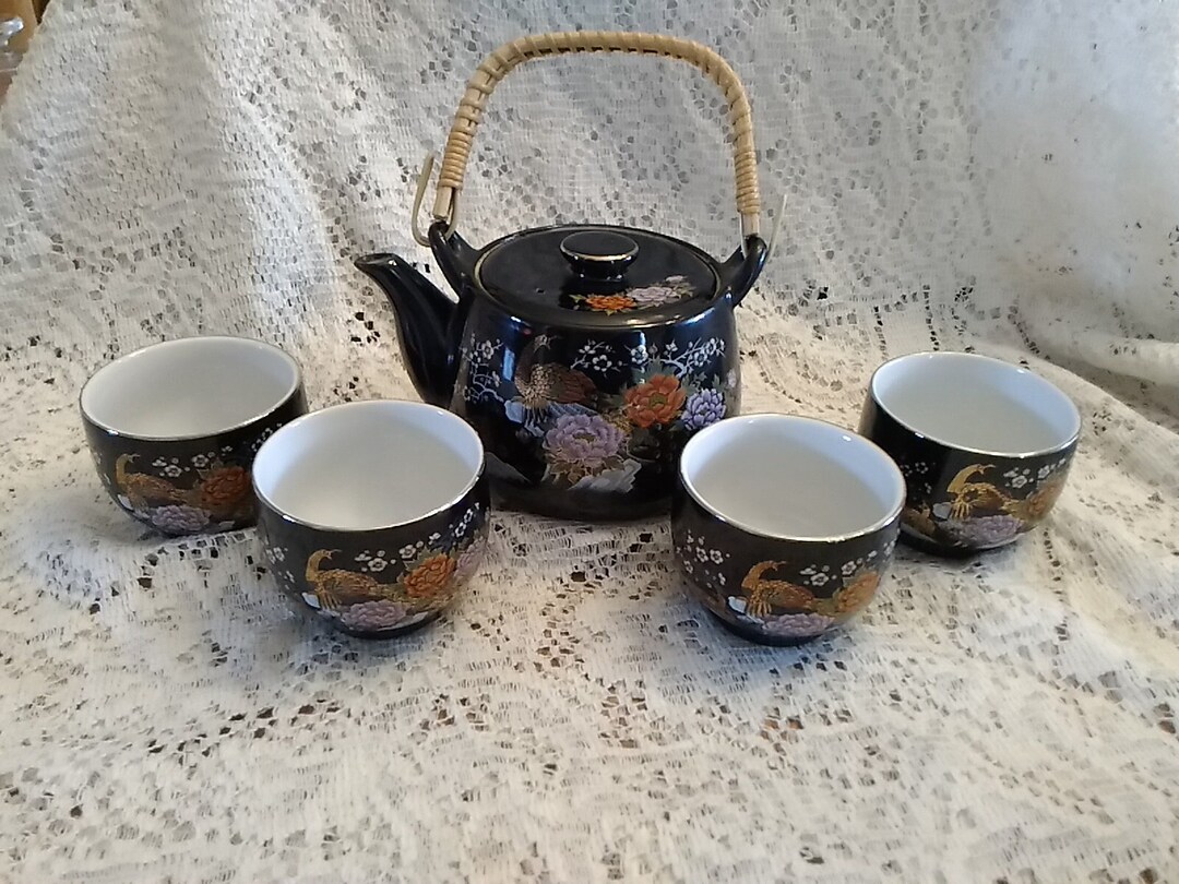 A Cobalt Blue Porcelain Tea Set With a Hold Trim and Peacock Design on ...