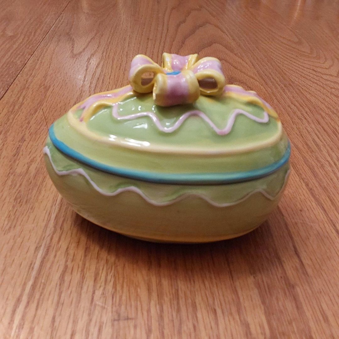 A 2-pc Ceramic Brightly Pastel Colored Easter Egg With a Bow. the ...