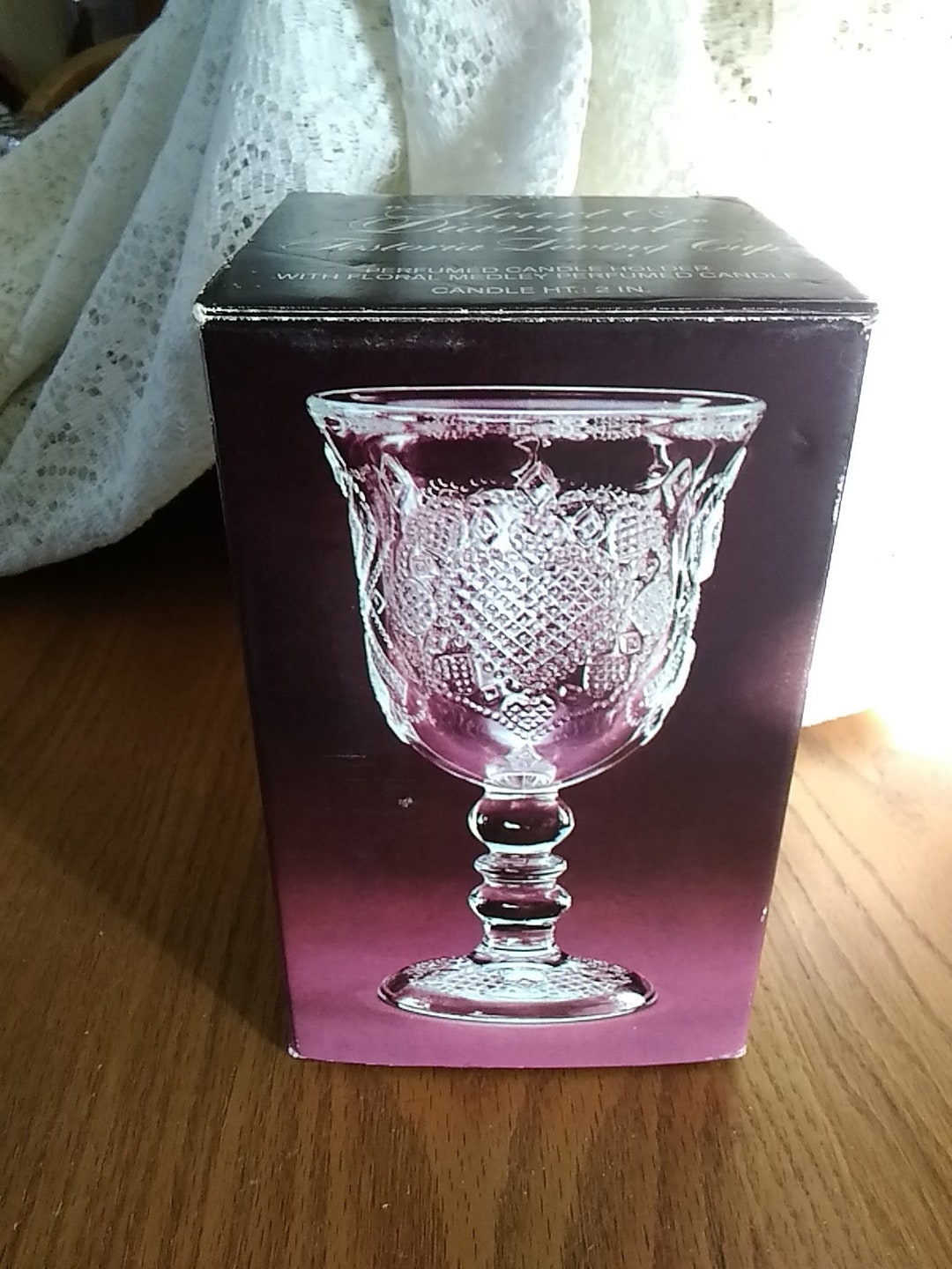 A Boxed Avon Clear Glass Goblet Shape That is a Candle Holder With a ...