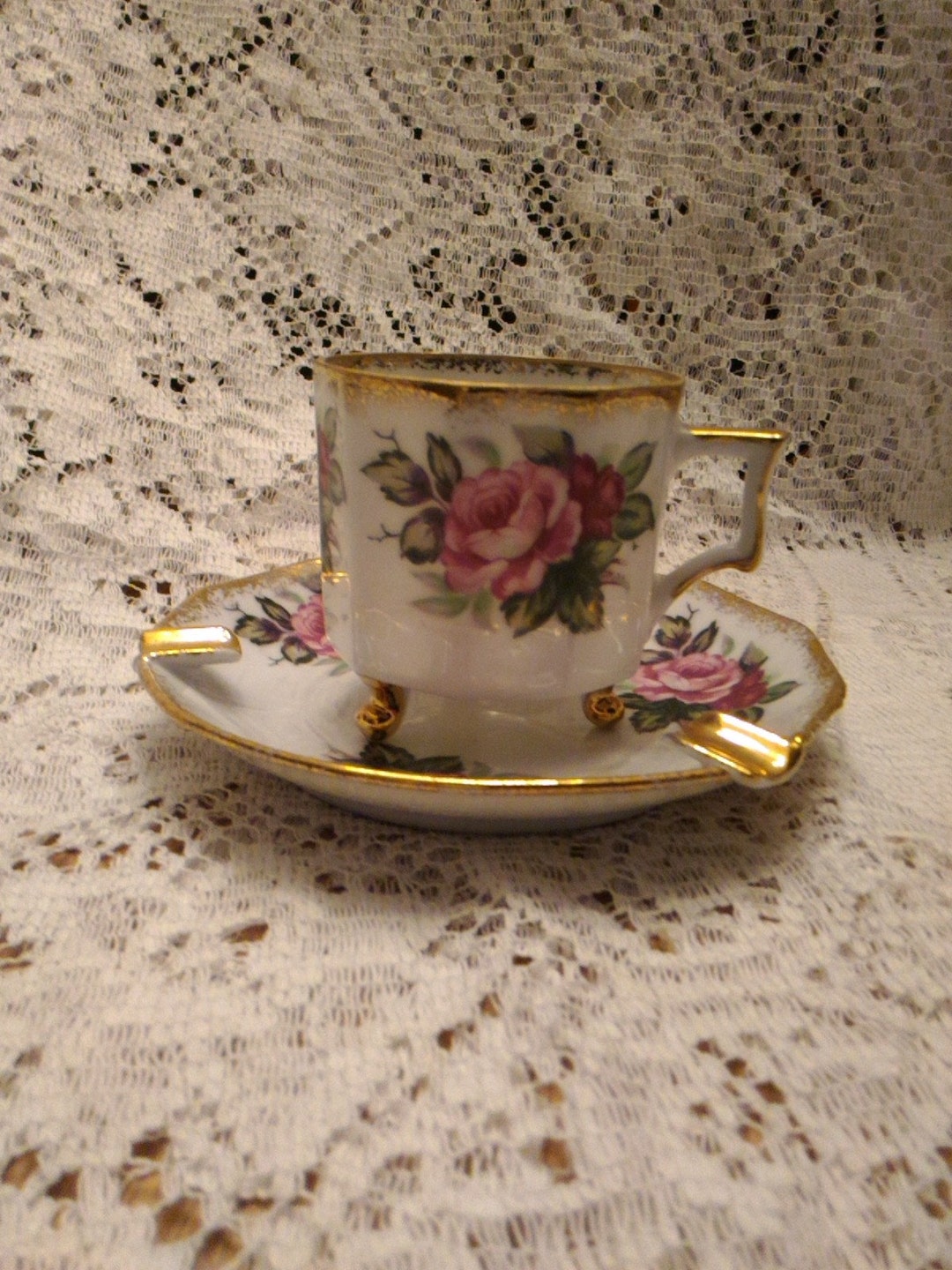 A White Decagon Porcelain Three Toes 5 Oz Cup With Shades of Pink Roses ...