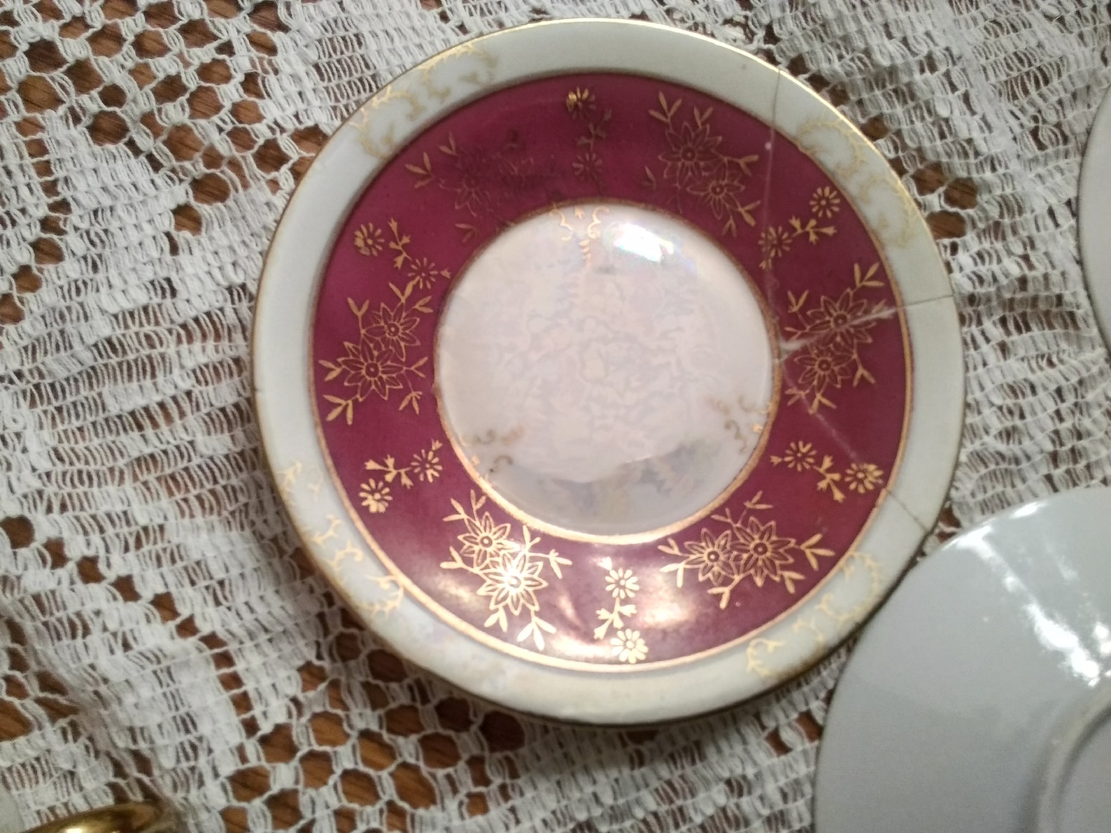 A 15 Piece Porcelain Tea Set in White, Maroon, and Gold Lusterware. the ...