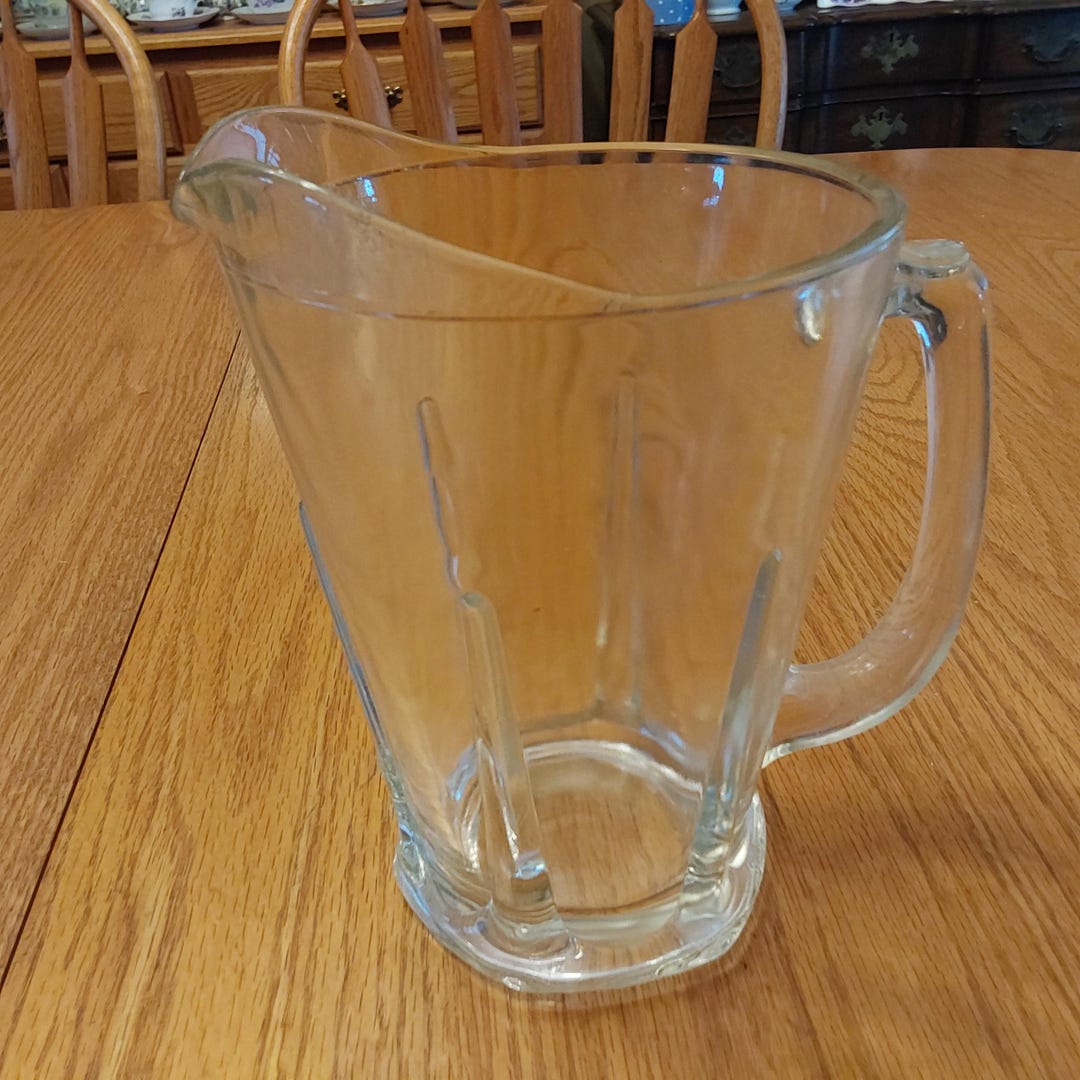 A Heavy Clear 44 Oz Glass Beer Pitcher With Thumbrest, to Help While ...