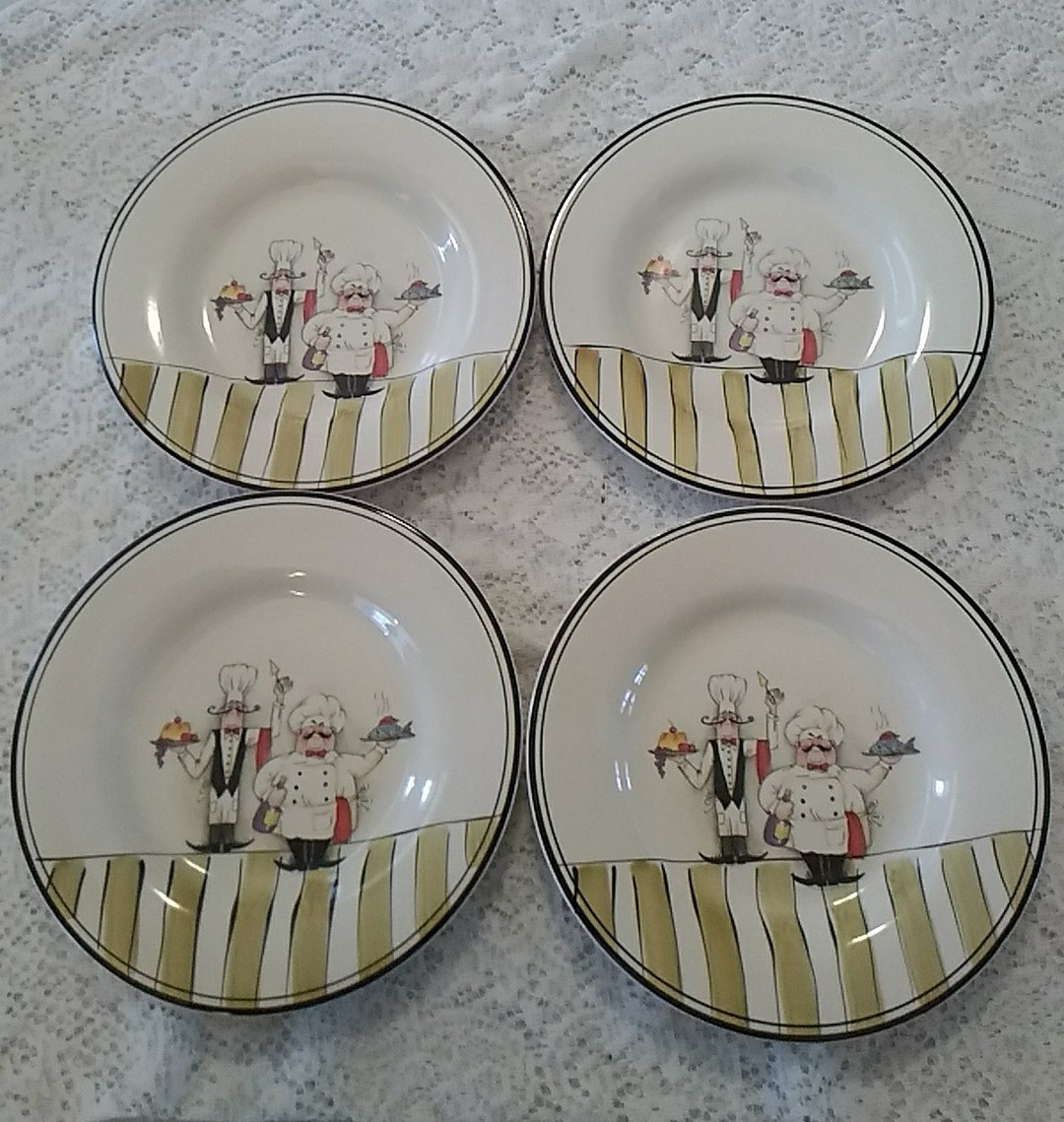 A Set of HD Designs 4-11 Inch Dinner Plates With a Le Chef Motif in ...