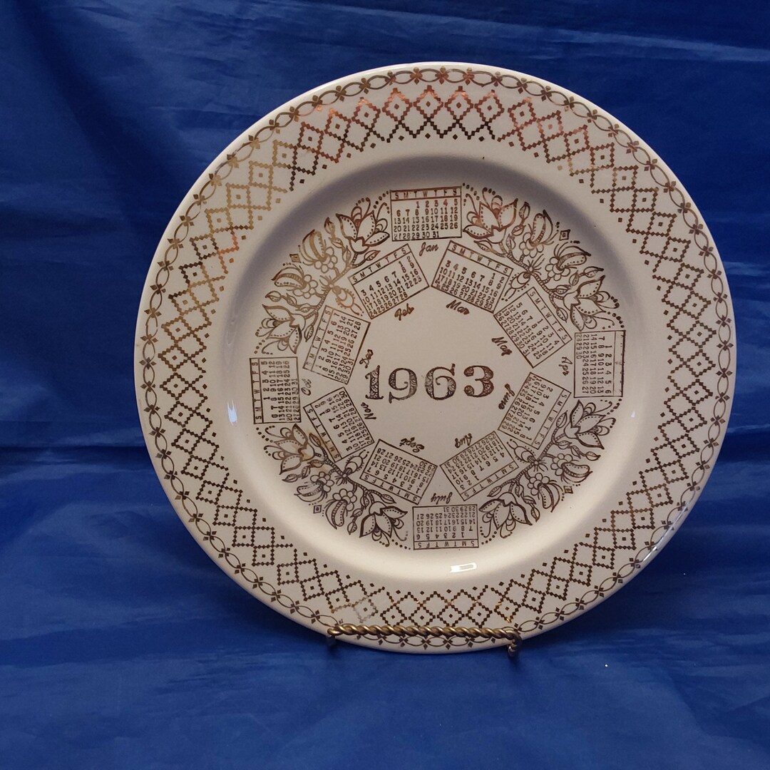 A 1963 Ivory Calender Plate in 22 Kt Gold With a Floral Design by ...
