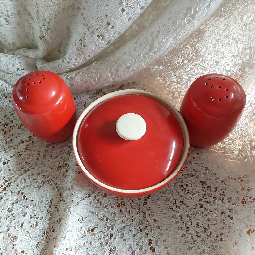 A Marked Cambridge Pottery Matching Salt and Pepper Shakers and a ...
