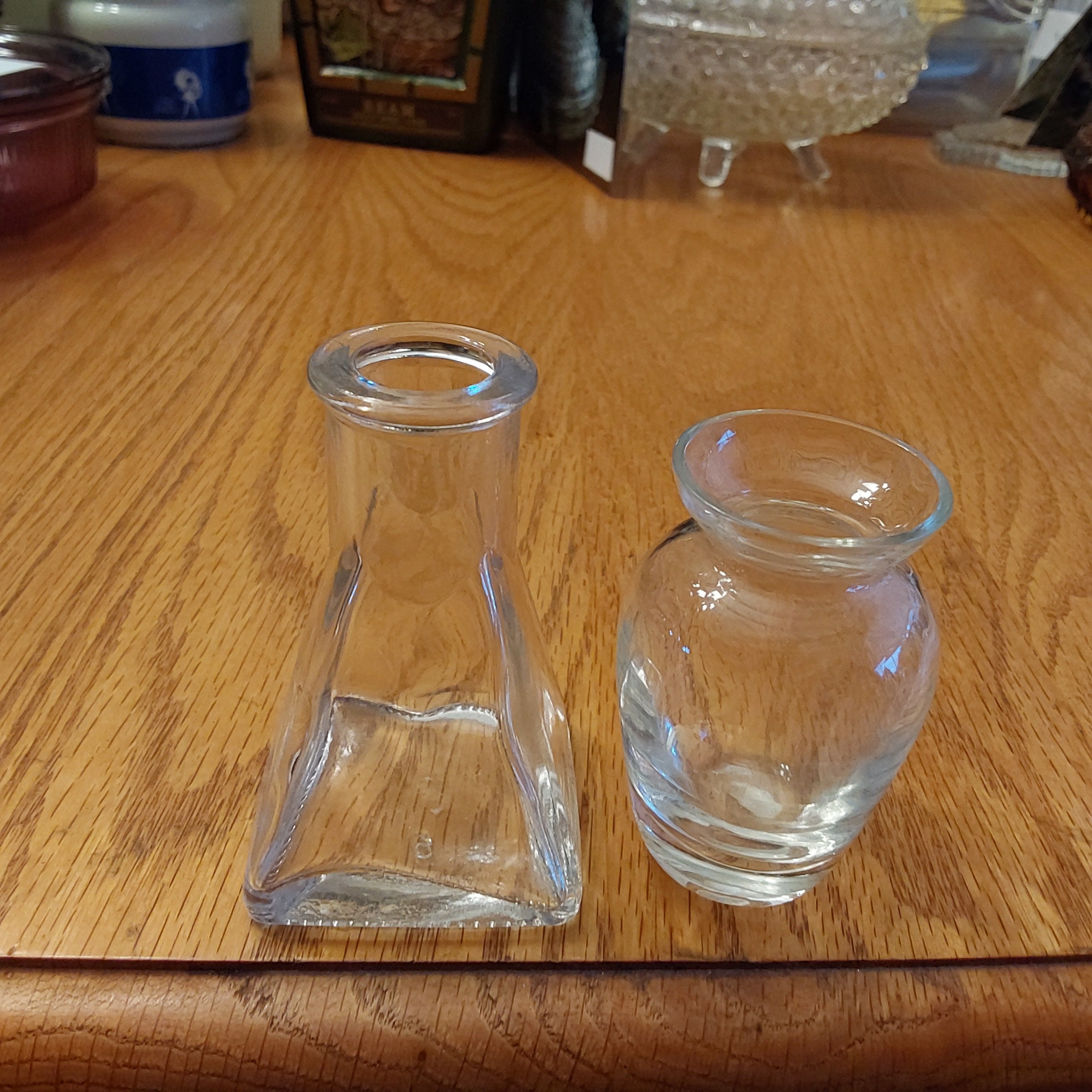 Two Clear Mismatched Glass Bottles to Use as Bud Vases. the Round ...