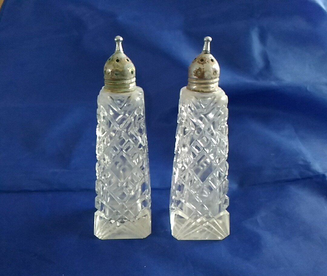 A Matching Pair of 2- I Rice Crystal Tall Salt and Pepper Shakers. the ...